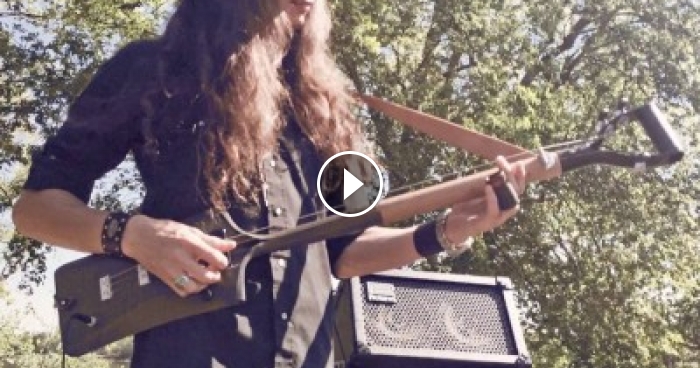 Guy Plays A Song On His 3-String Shovel Guitar | Klipland.com