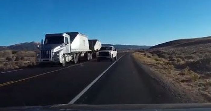 Pickup Almost Slams Head On Into A Car While Passing A Semi Truck