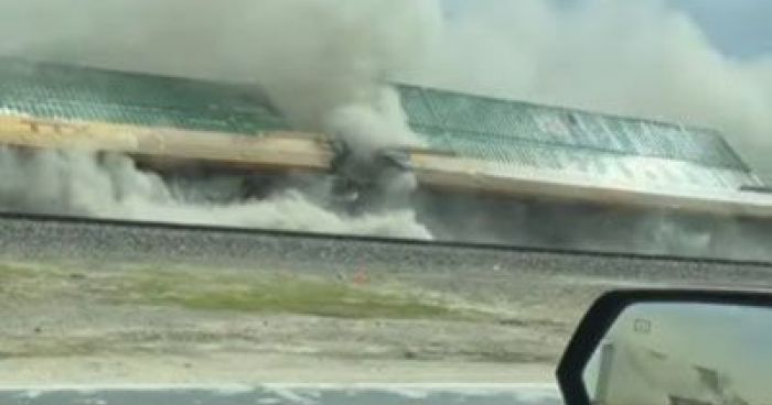 Driver Captures Moment Train Tips Over On Its Side | Klipland.com