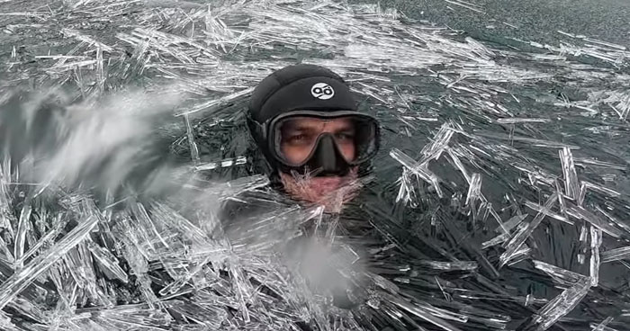 Diver Swimming In A Lake Full Of Ice Needles | Klipland.com