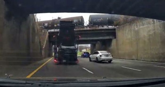 Overheight Car Carrier Strikes An Overhead Bridge | Klipland.com
